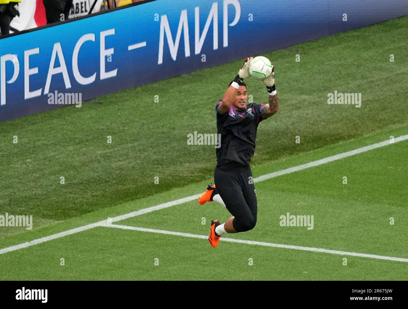 West Ham goalkeeper Alphonse Areola warms up before the Europa ...