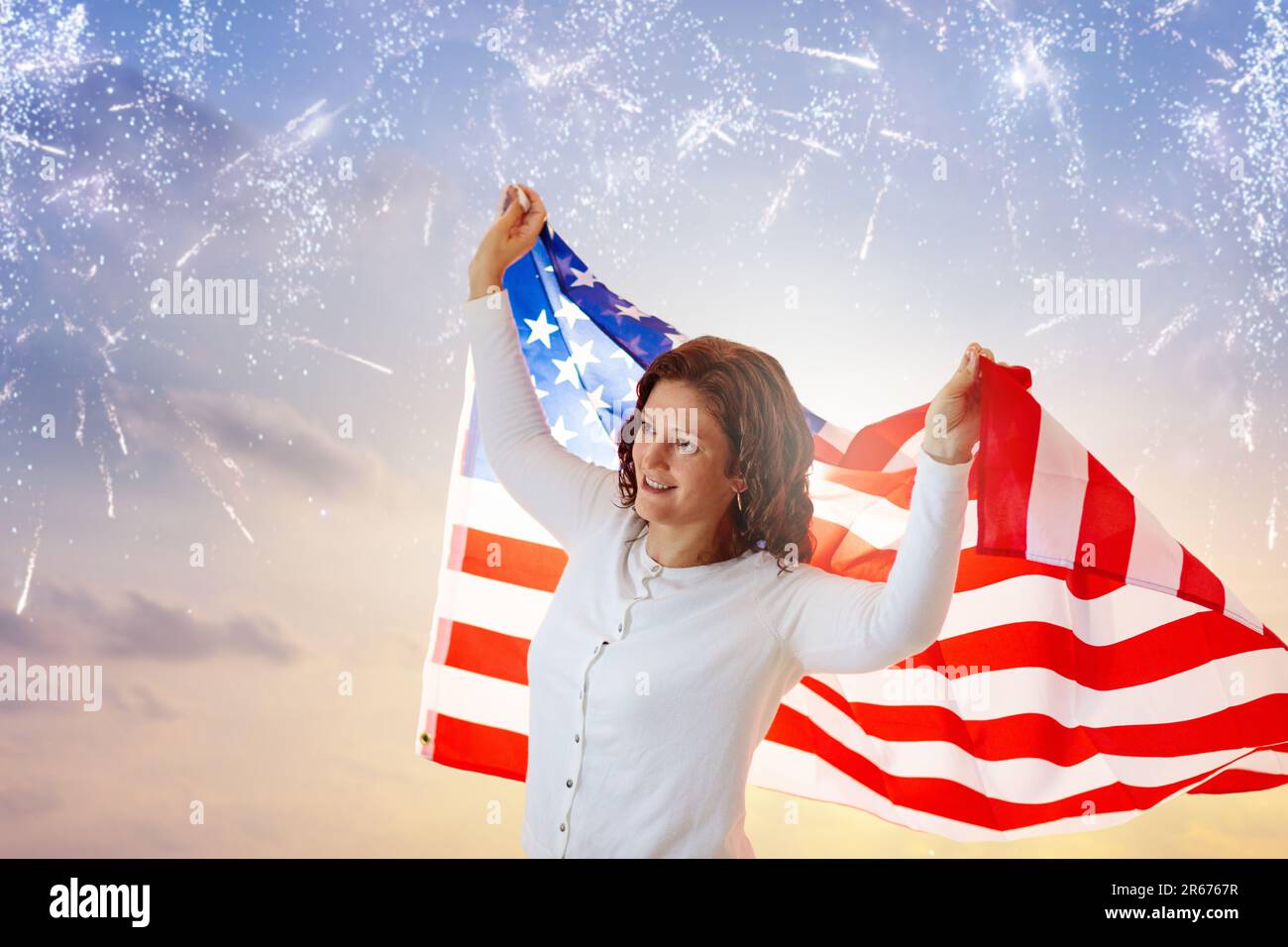 American family celebrating 4th of July. Woman watching Independence ...