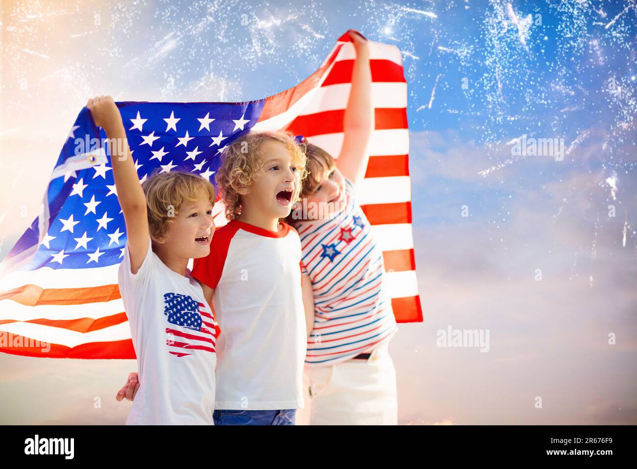 American family celebrating 4th of July. People watching Independence ...