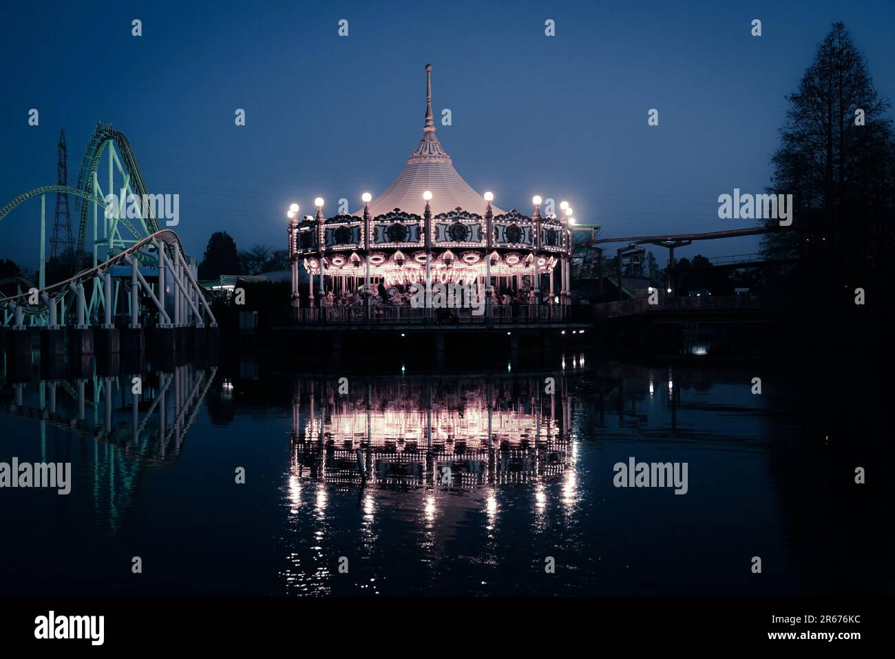 Merry go round night park hi-res stock photography and images - Alamy