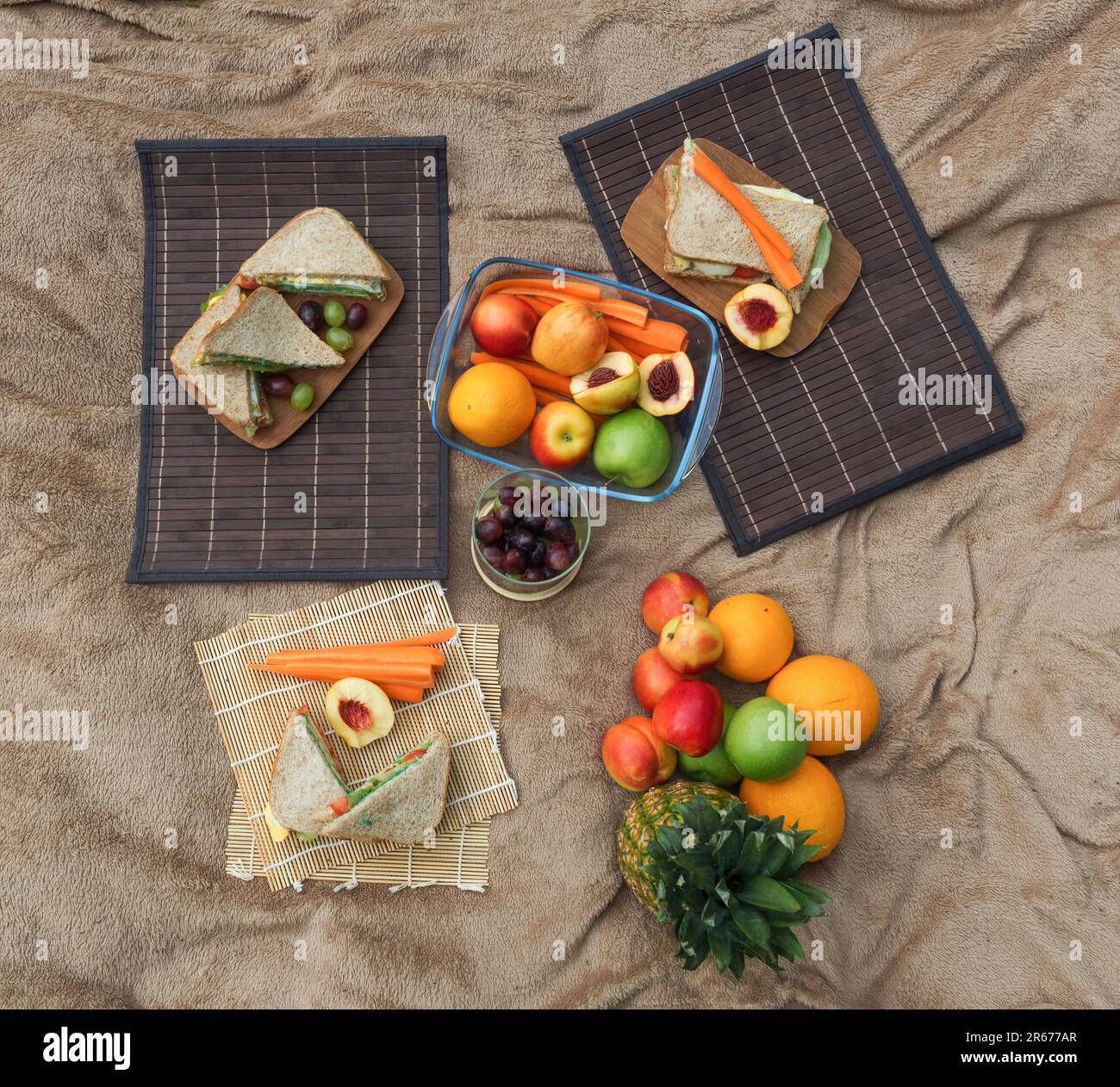 A healthy picnic with fruits at summer with friends Stock Photo - Alamy