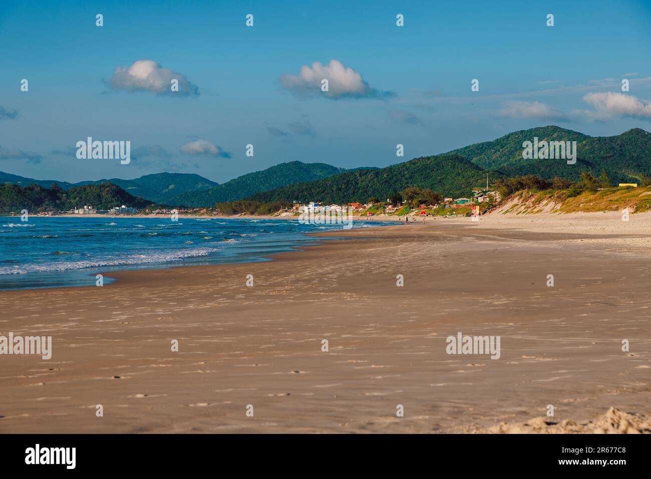 Sand beach and blue ocean with waves in Brazil Stock Photo - Alamy
