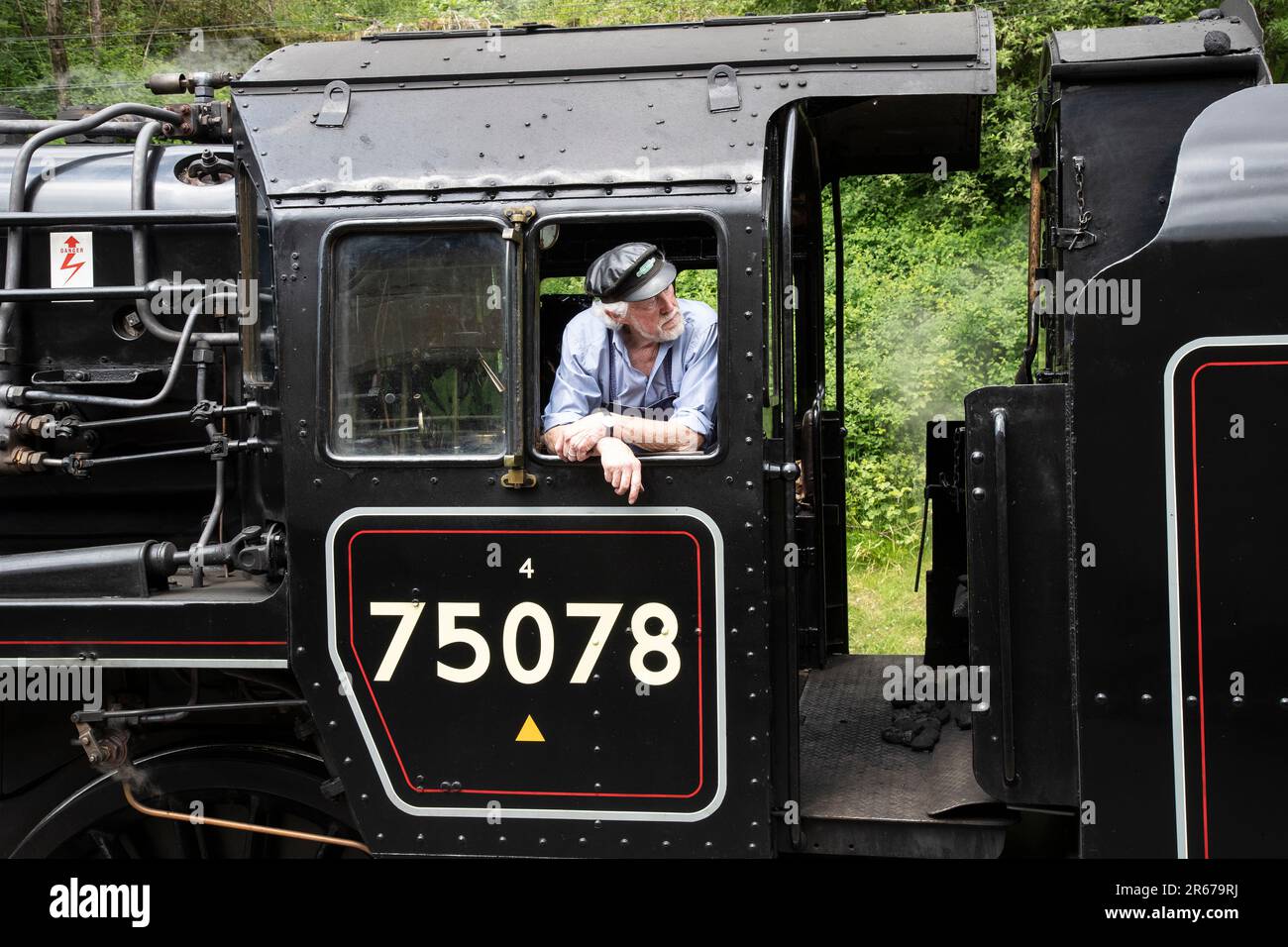 BR Standard Class 4MT 4-6-0 steam locomotive with the engine driver ...