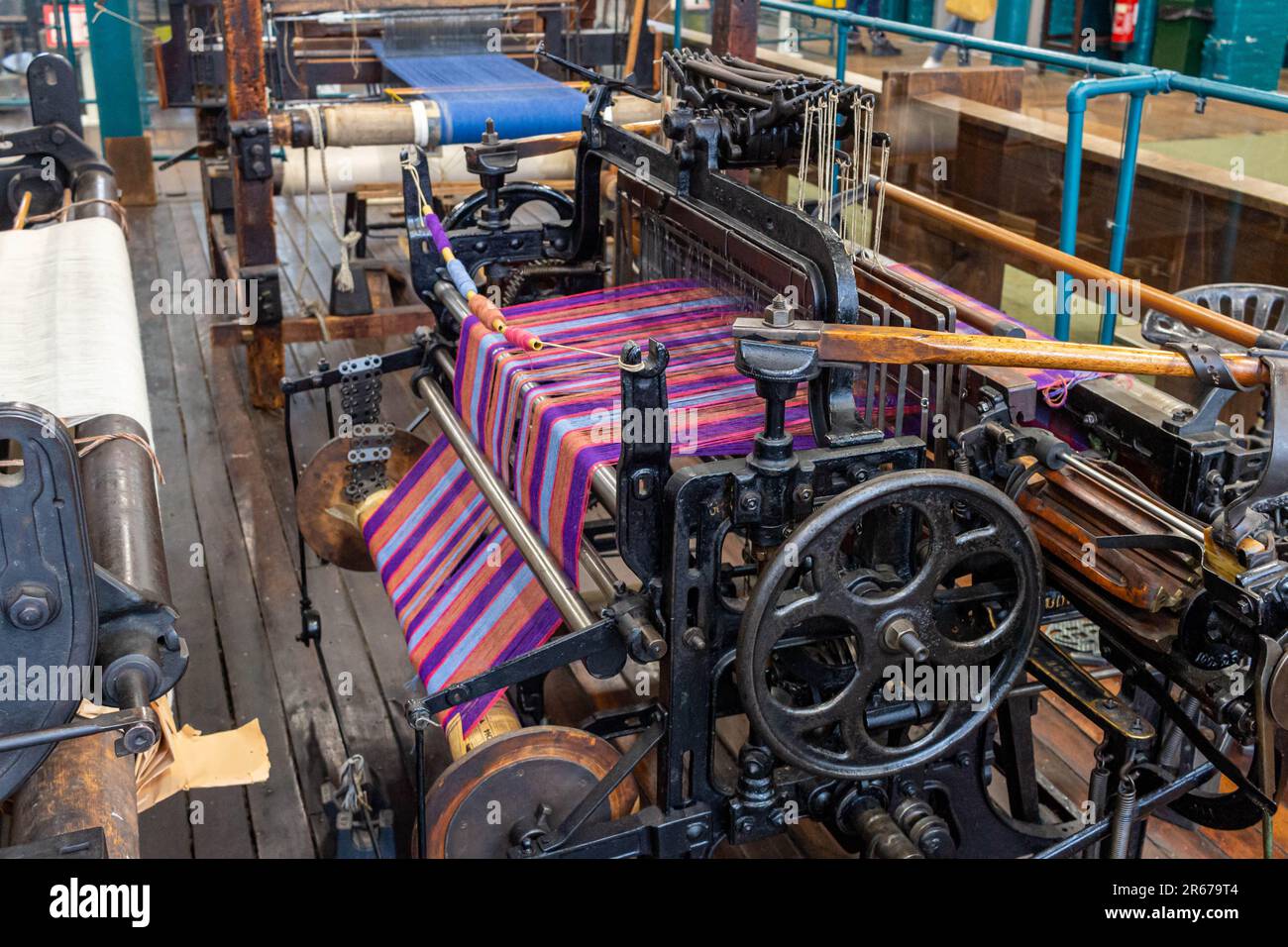 This image depicts a modern industrial machine used to create cone ...