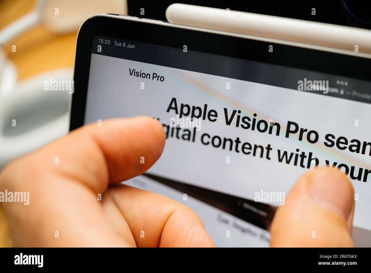 Paris, France - Jun 6, 2023: Virtual touching of Apple Vision Pro mixed reality XR headset word ...