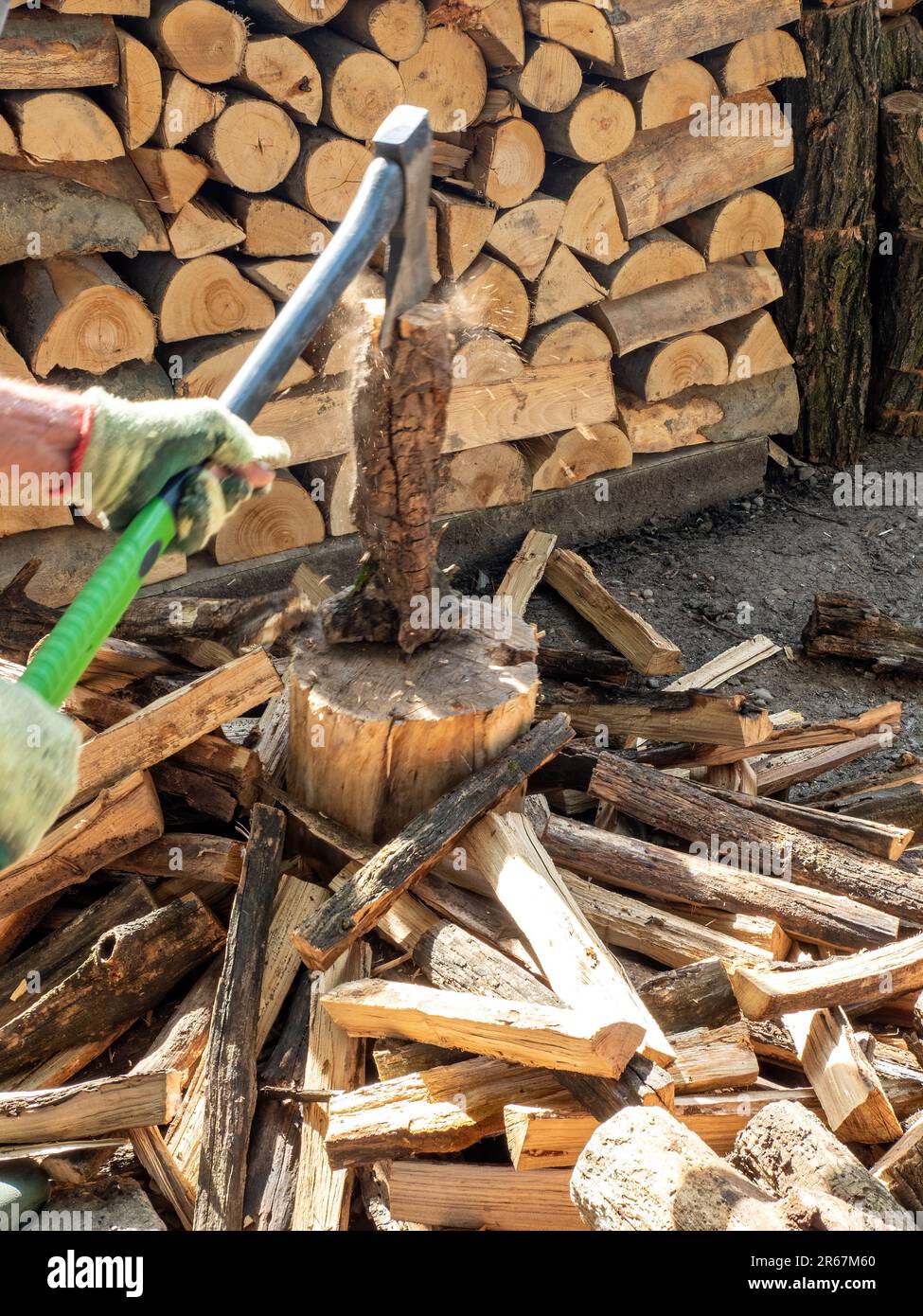 Woodpile and axe hi-res stock photography and images - Alamy