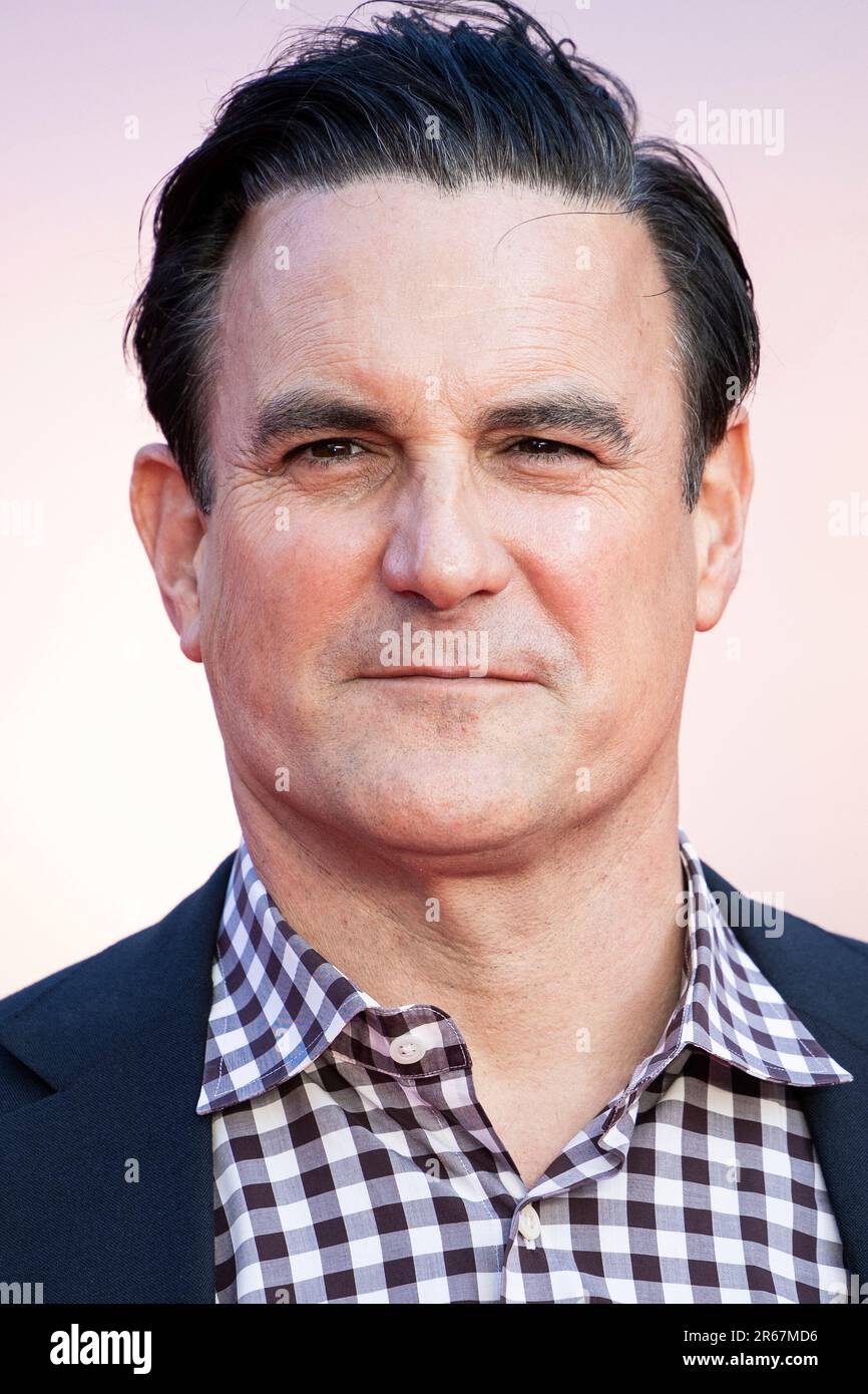 Mark Vahradian poses for photographers upon arrival at the premiere of ...