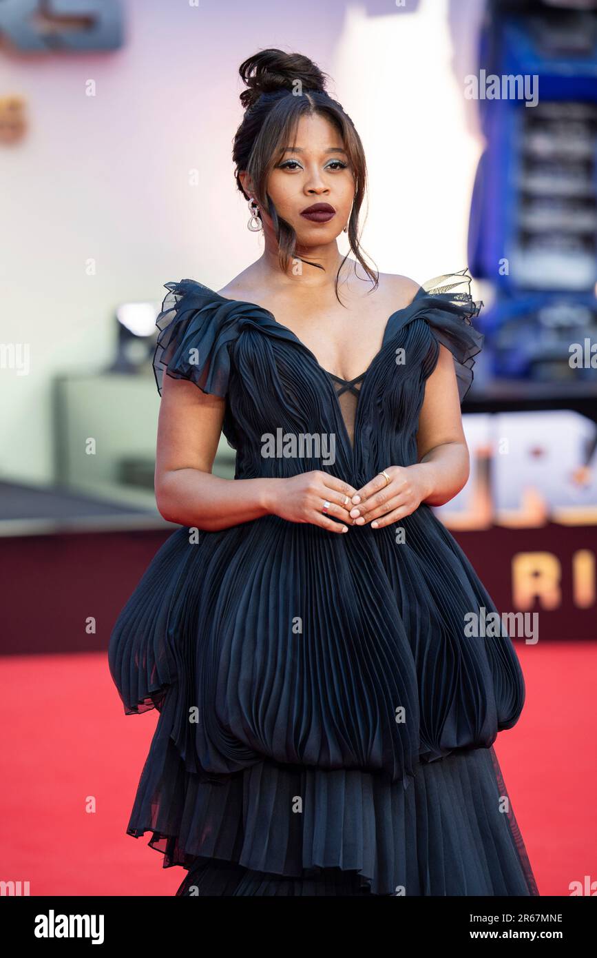 Dominique Fishback poses for photographers upon arrival at the premiere ...