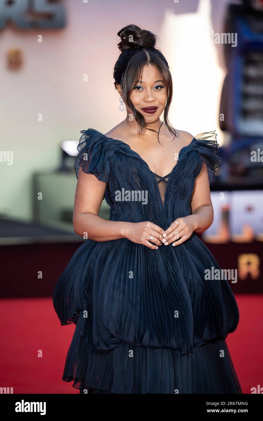 Dominique Fishback poses for photographers upon arrival at the premiere ...