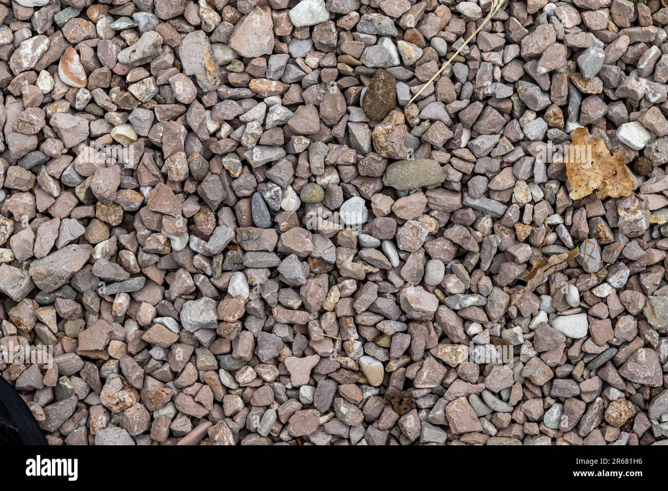 Texture of gravel scattered on the ground Stock Photo - Alamy