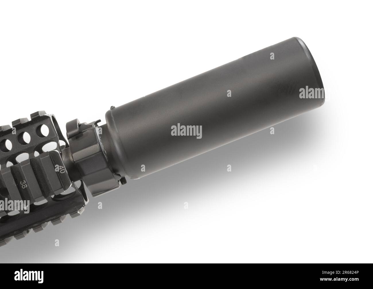 AR-15 with a suppressor mounted and shadow below Stock Photo - Alamy