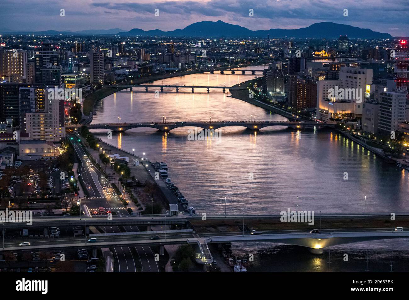 Historic Bandai Bridge and the beautiful night view along the Niigata ...