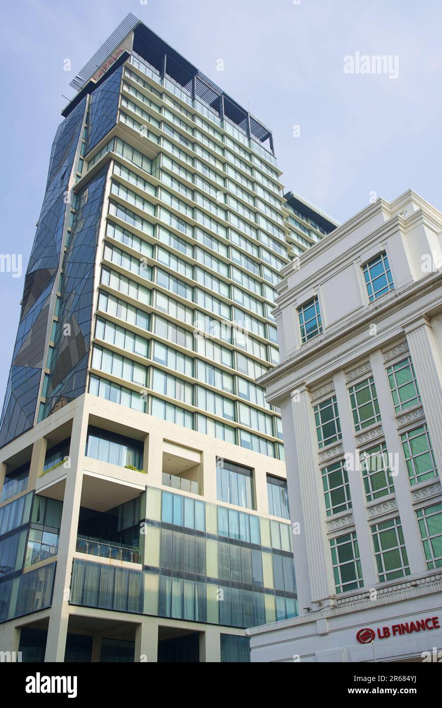 This impressive building features a modern structure, with a tall and ...