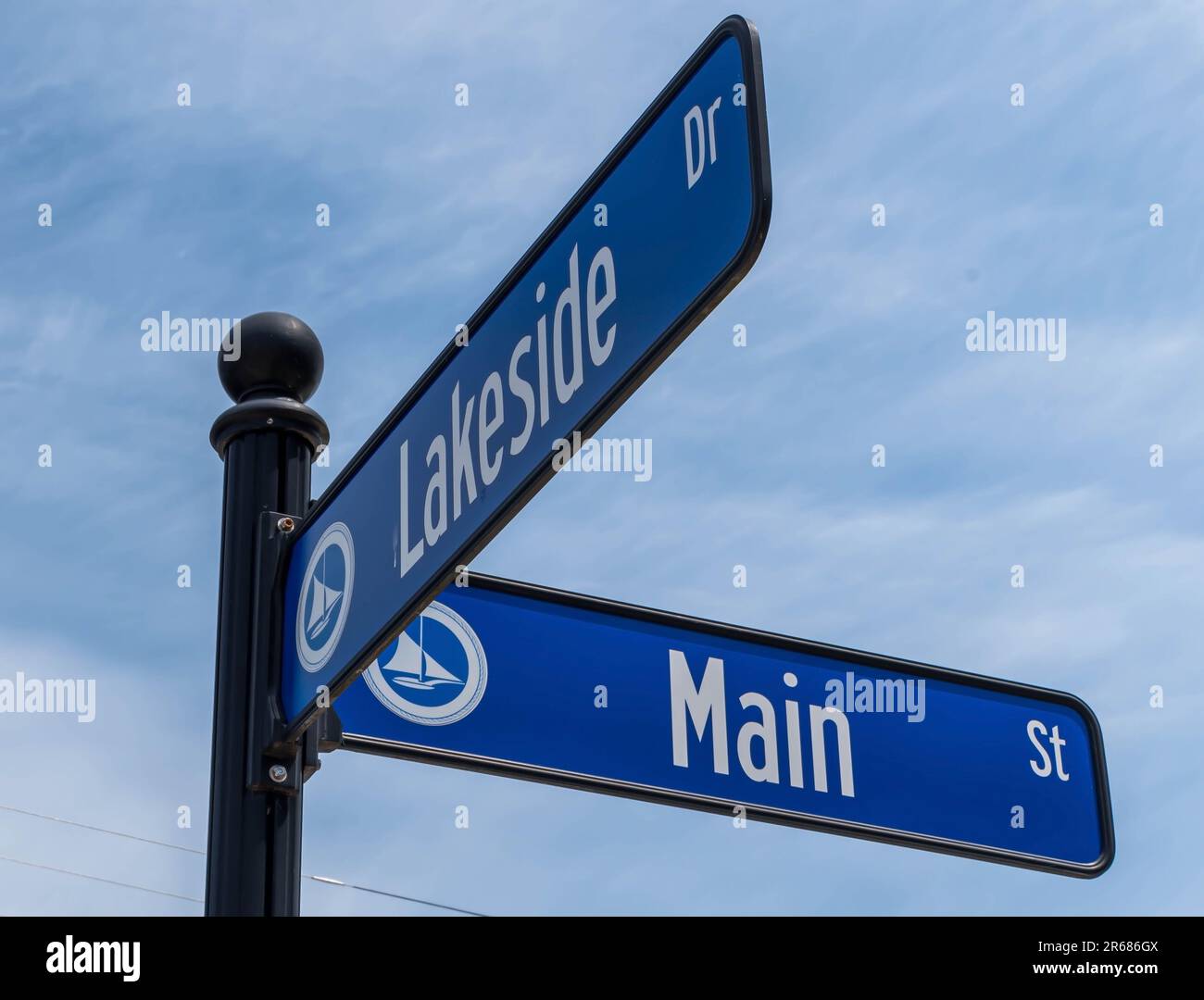 Street signs at the corner of Main Street and Lakeside Drive in Beemus ...