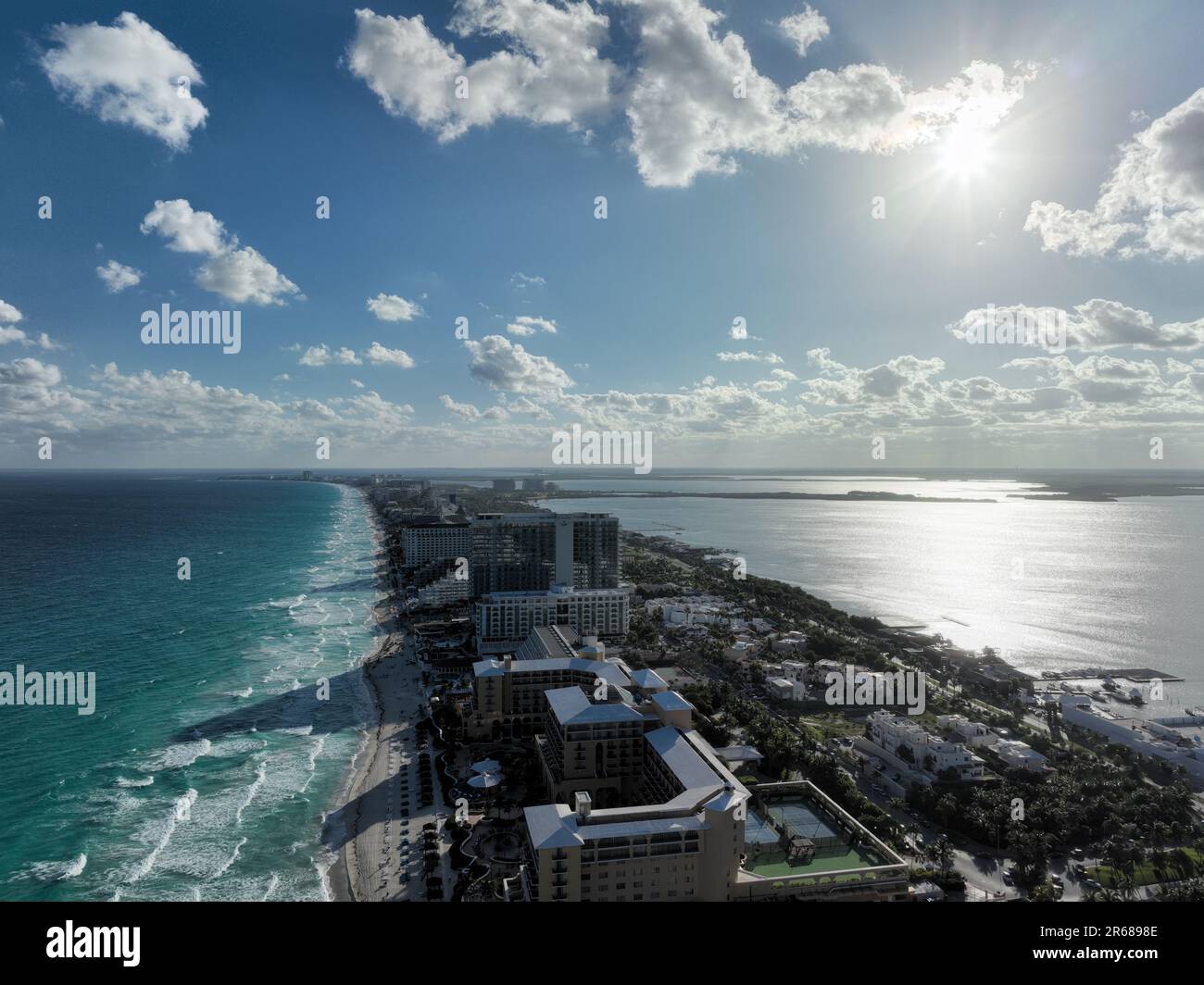 An aerial view of the Caribbean coast of Mexico, with the bright blue ...