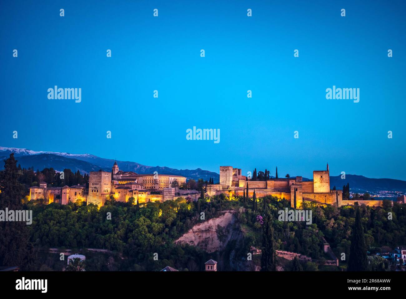 Photography of the Alhambra at night illuminated Stock Photo - Alamy