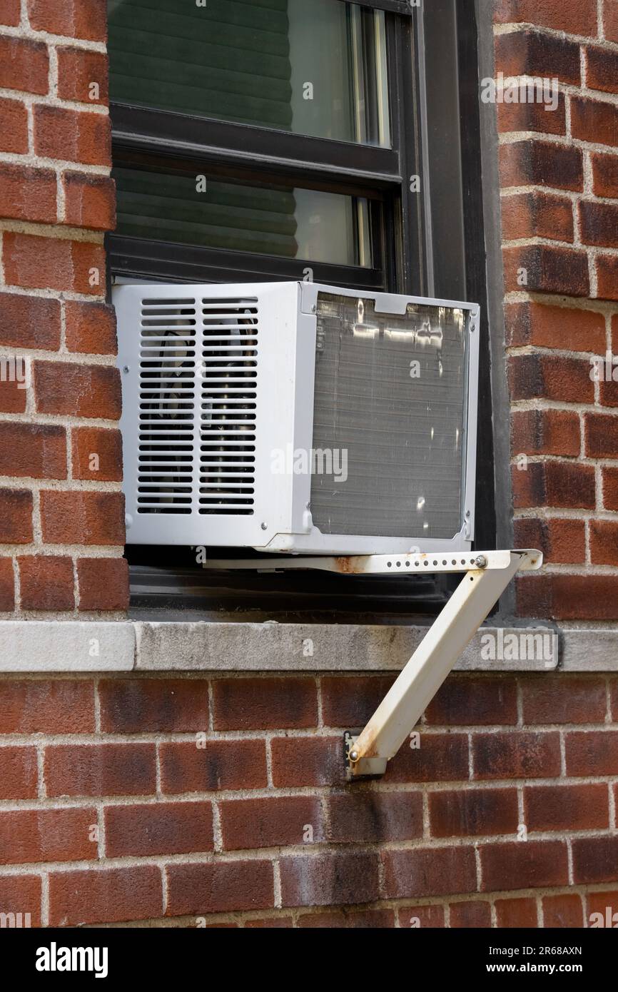 vertical shot of exterior view of air conditioning window unit ...