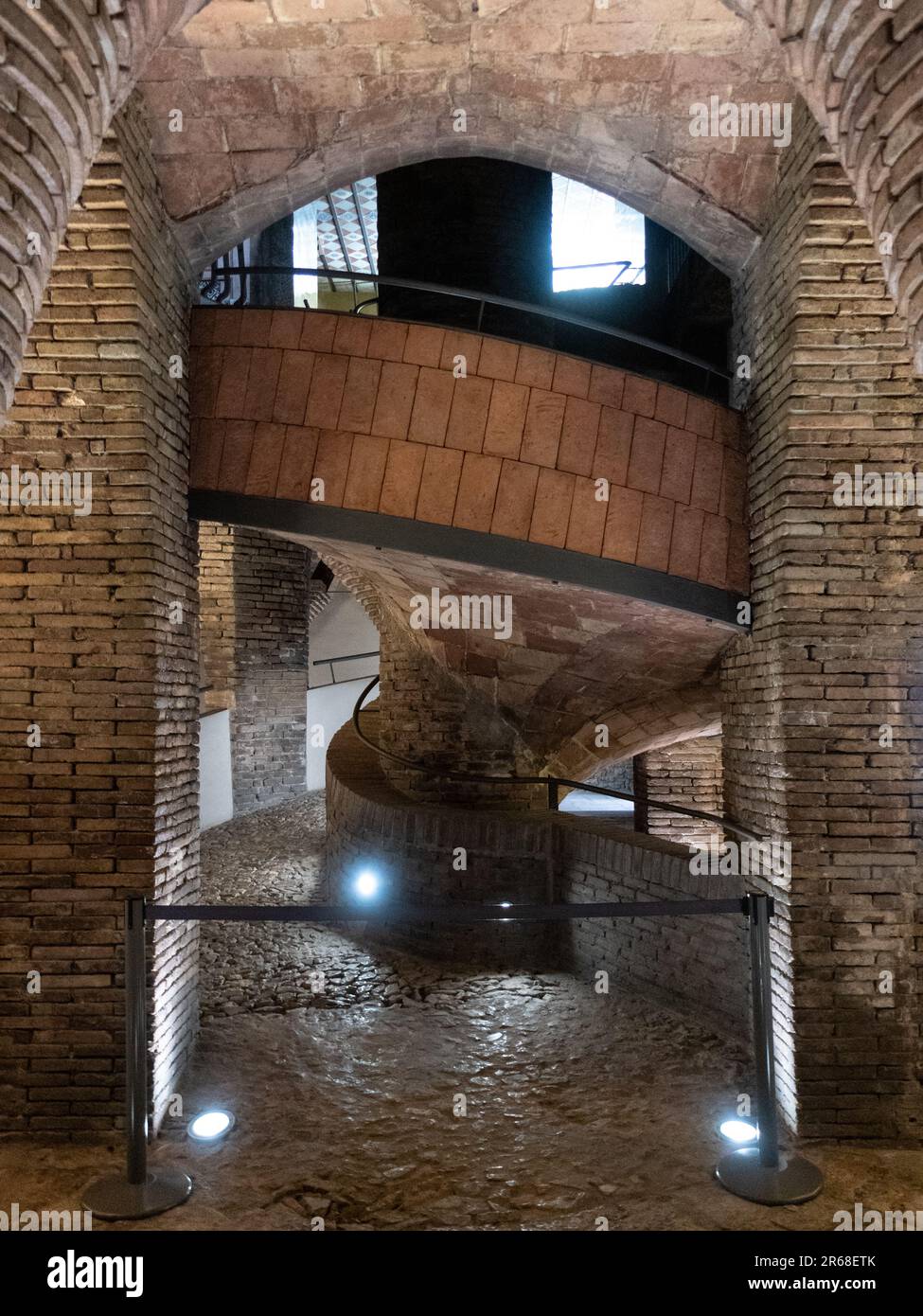 Guell Palace brick & cobblestone staircase @ basement level, designed ...