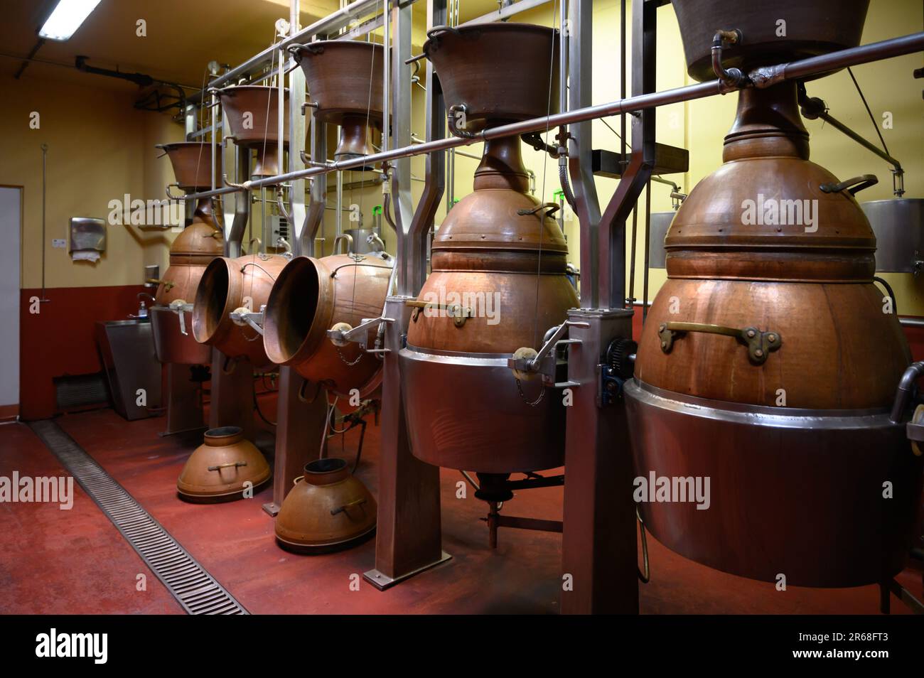 Gin alcoholic drink distillation process in copper tanks in Spanish ...