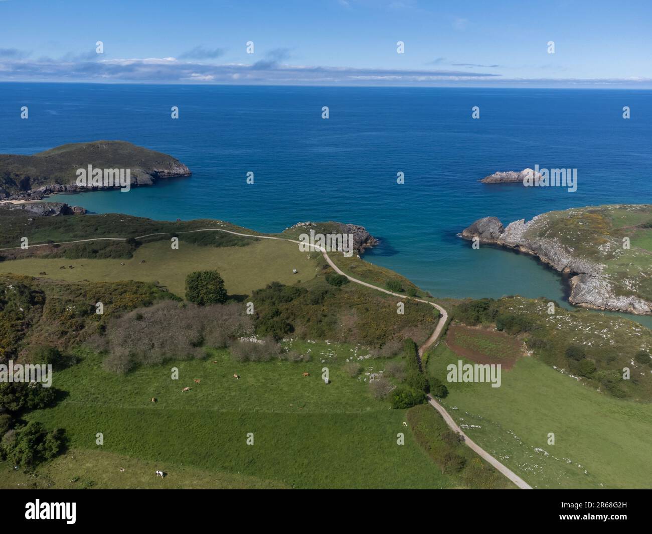 Aerial view on Playa de Poo during low tide near Llanes, Green coast of ...