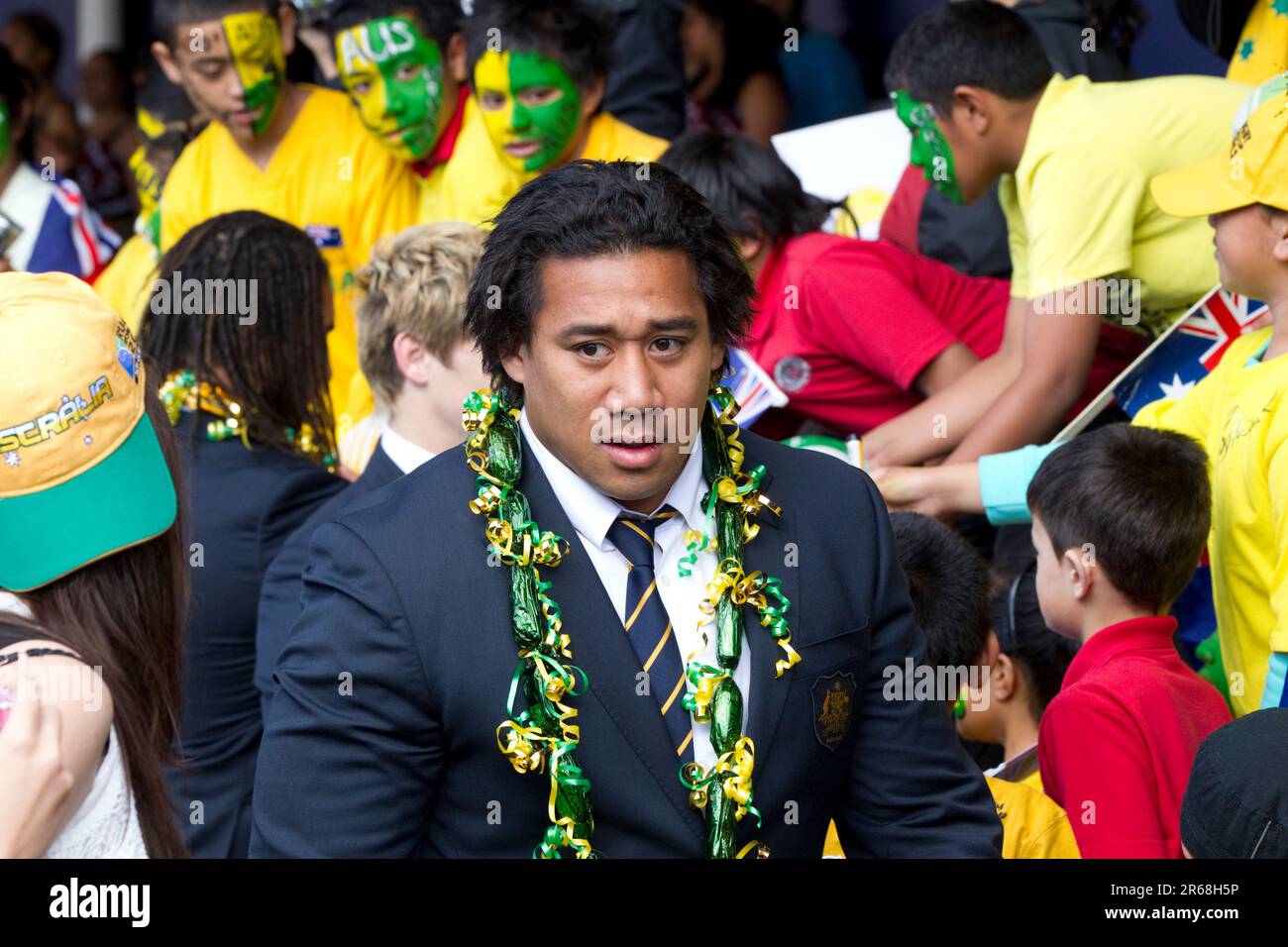 Prop Salesi Ma'afu walks through athrong of supporters as Australia's ...