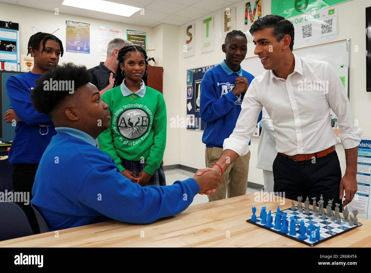 Prime Minister Rishi Sunak greets students as he visits the Friendship ...