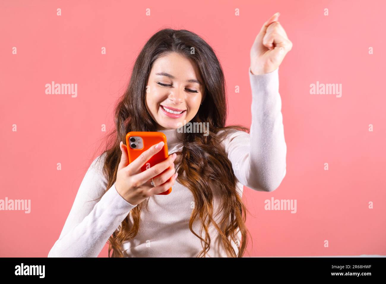 Long haired woman shocked delighted hi-res stock photography and images ...