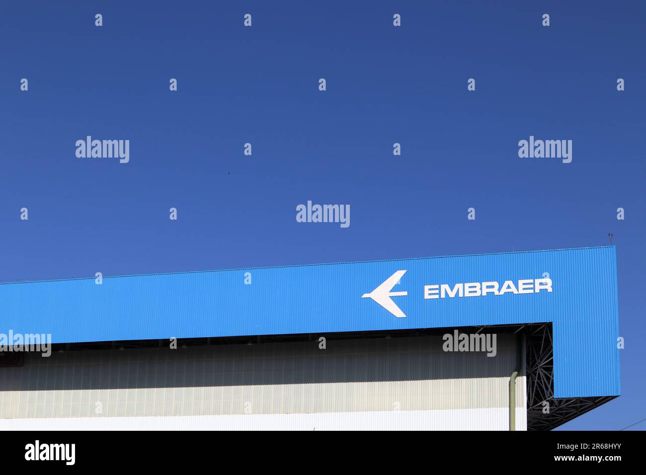 Embraer factory view against blue sky Stock Photo - Alamy
