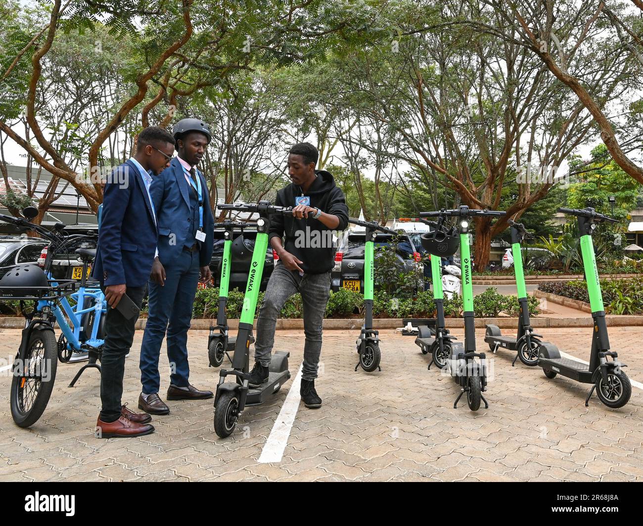 Nairobi, Kenya. 6th June, 2023. A man stands on an electric scooter during a Low-carbon E ...