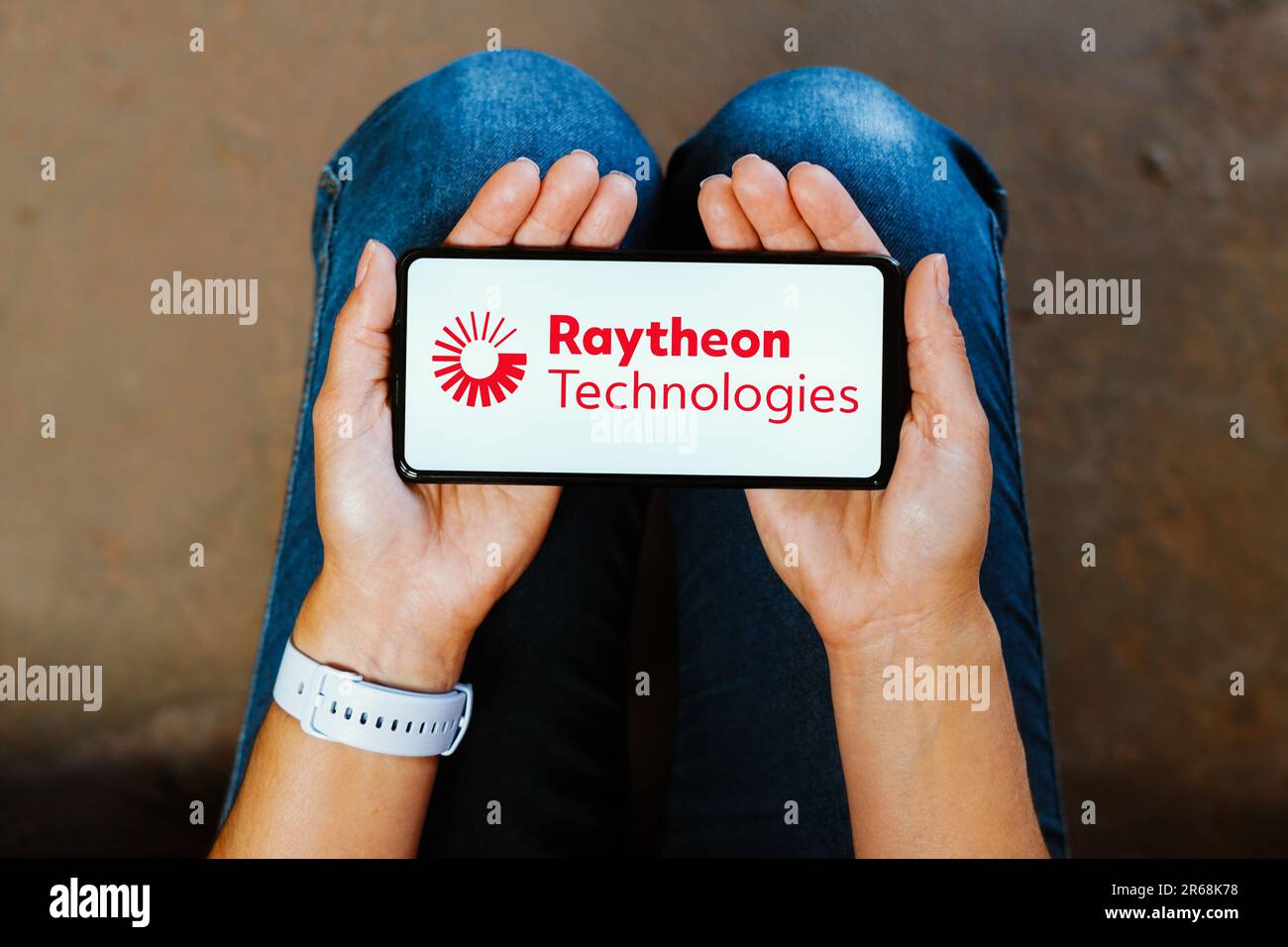 In this photo illustration, the Raytheon Technologies Corporation logo ...