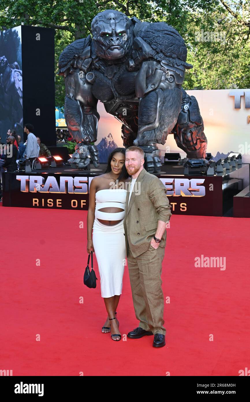 London, UK. 7th June, 2023. Chyna Mills and Neil Jones at Transformers ...