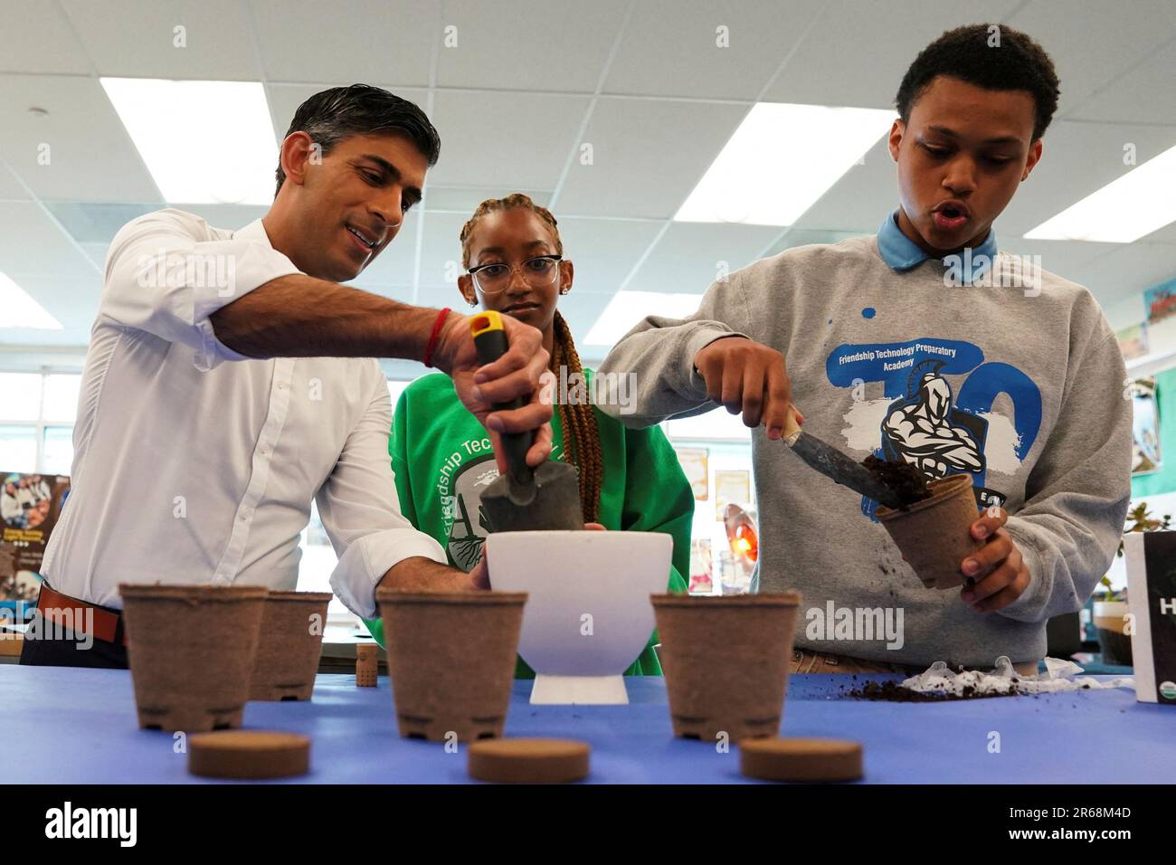 Prime Minister Rishi Sunak plants some jalapeno seeds as he takes part ...