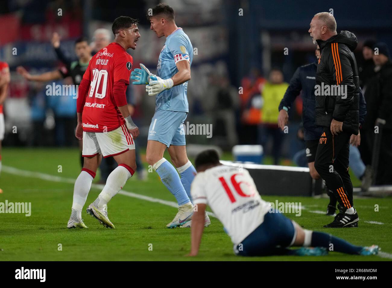 Romulo of Brazil's Internacional, left, confronts goalkeeper Sergio ...