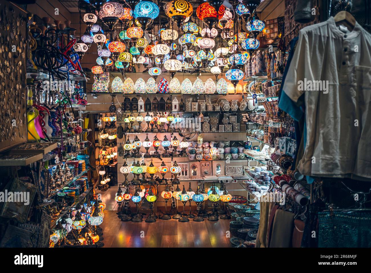 Typical shop in Granada with souvenir shops at night Stock Photo - Alamy