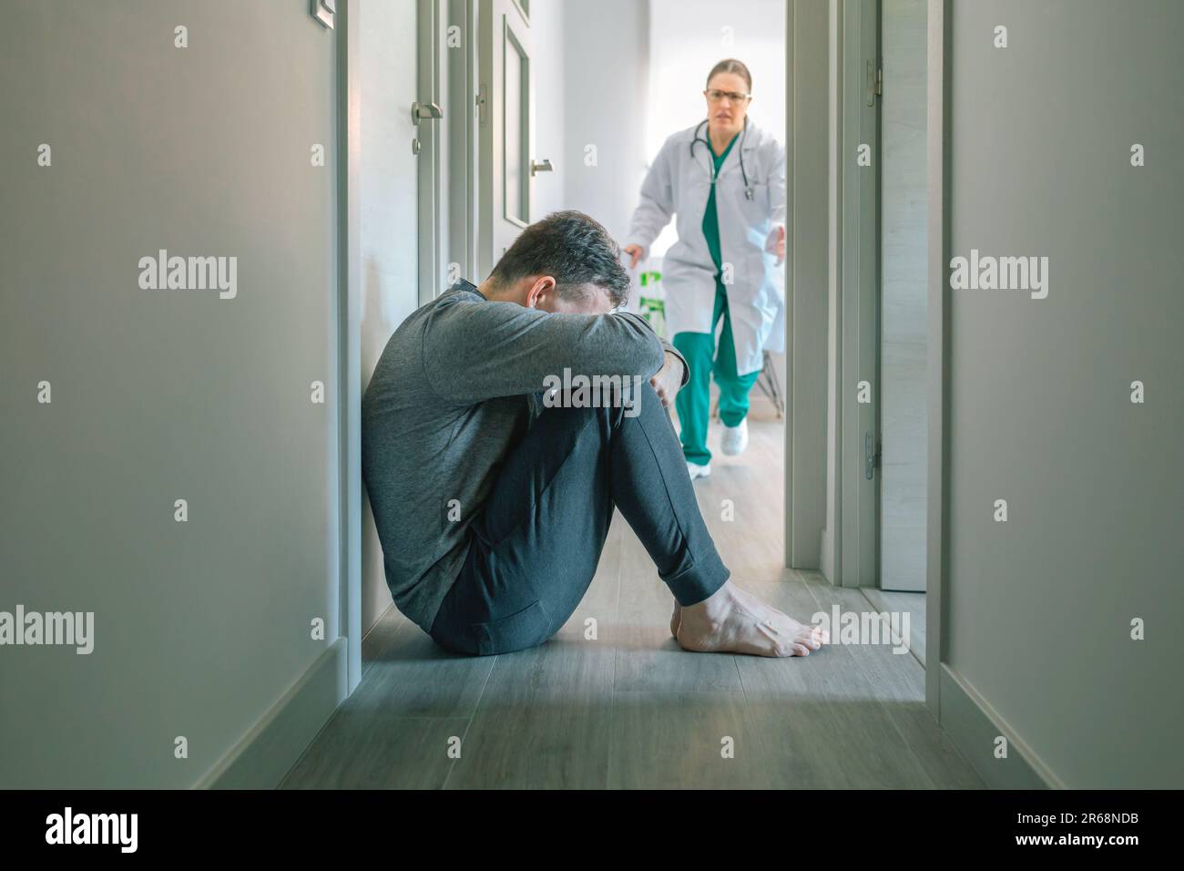 Female doctor running to help patient with mental disorder and suicidal ...