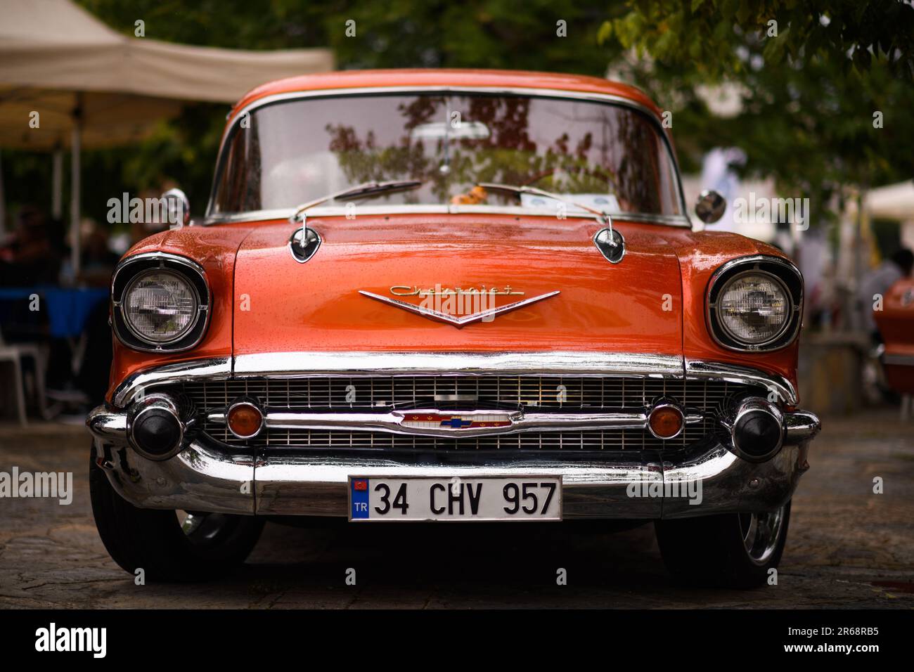 Izmir, Turkey - June 3, 2023: Front view of a orange 1957 Chevrolet ...