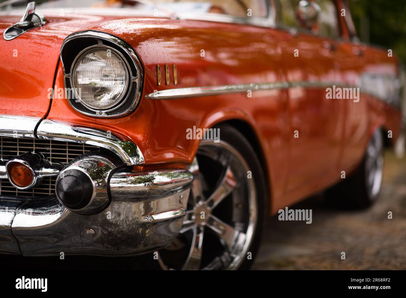 Izmir, Turkey - June 3, 2023: Close-up of the rain-soaked headlight and ...