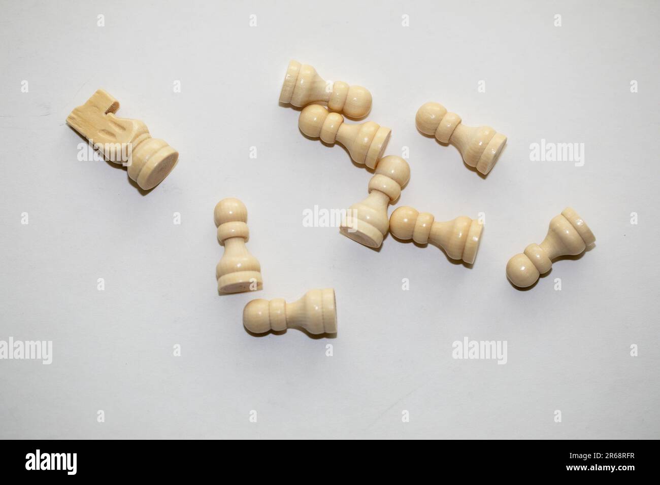 chess pieces, knight and pawns laying on a white background Stock Photo ...