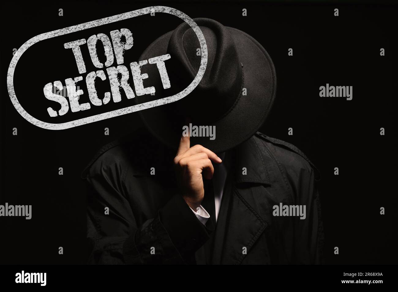 Classified information of investigation. Old fashioned detective in hat ...