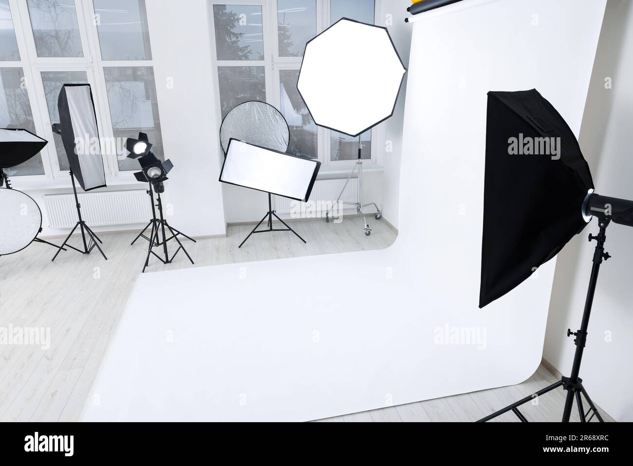 Interior of modern photo studio with professional lighting equipment ...