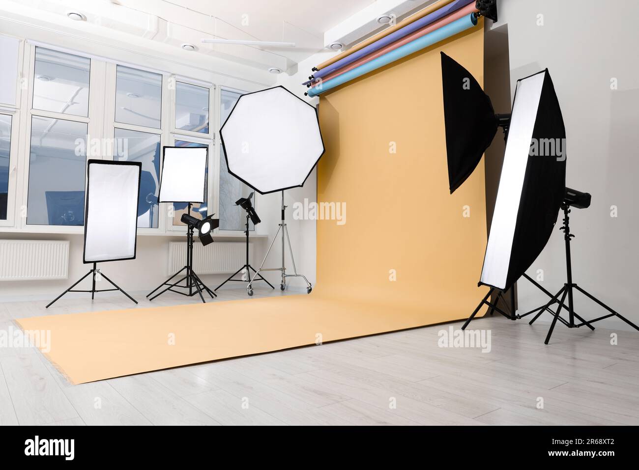 Interior of modern photo studio with professional lighting equipment ...