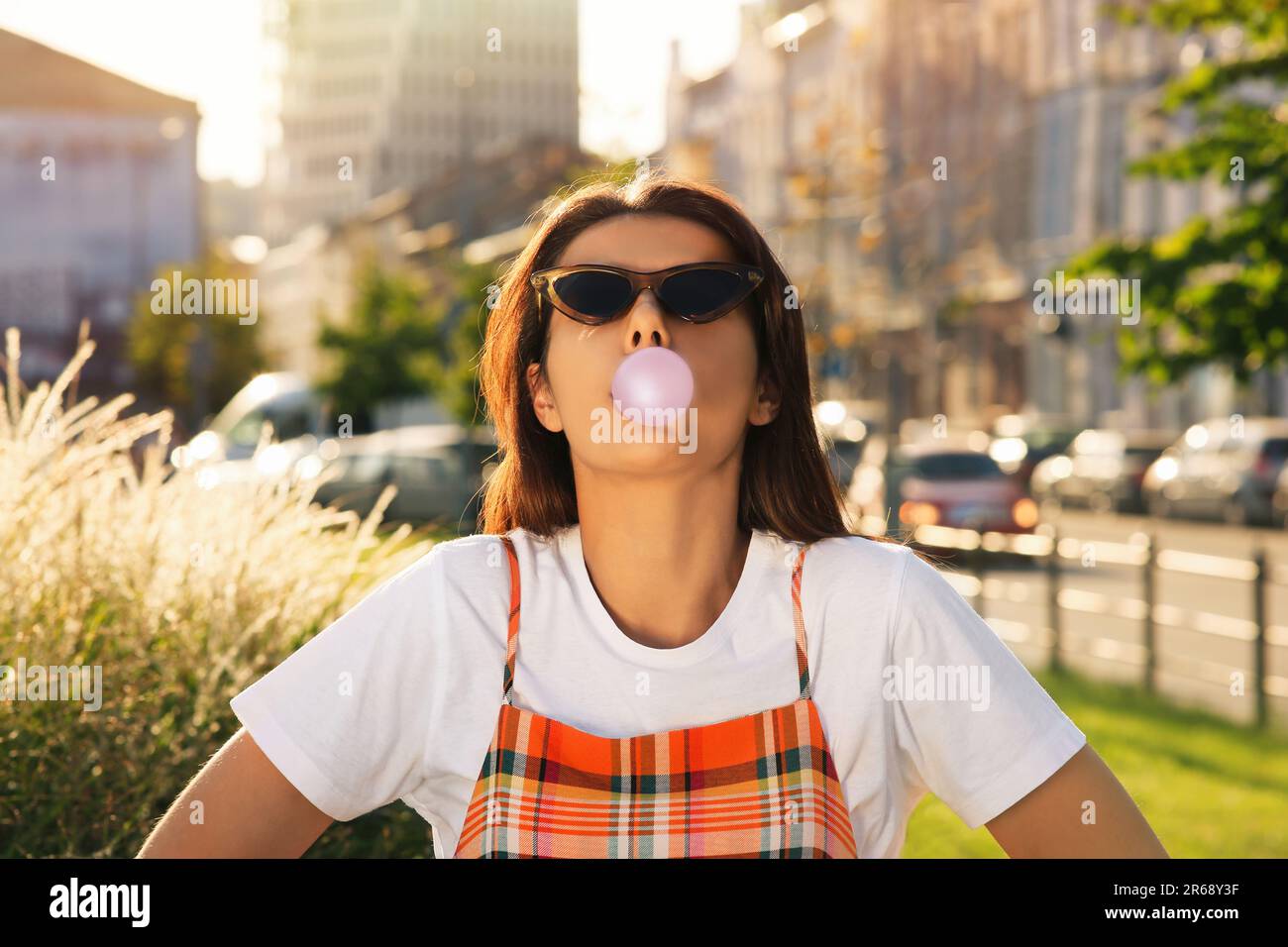 Portrait beautiful woman chewing gum hi-res stock photography and ...
