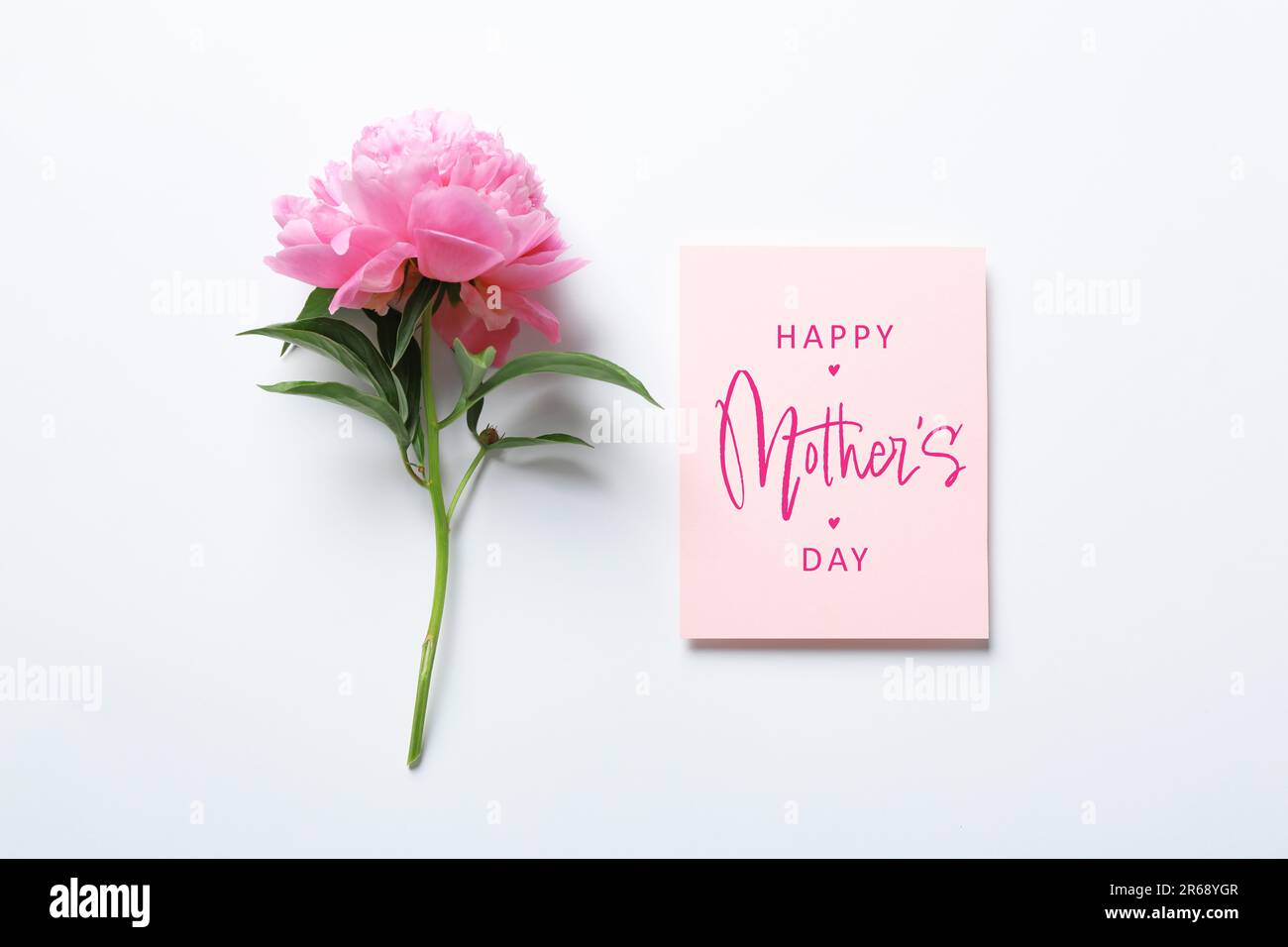 Happy Mother's Day greeting card and beautiful peony flower on white ...