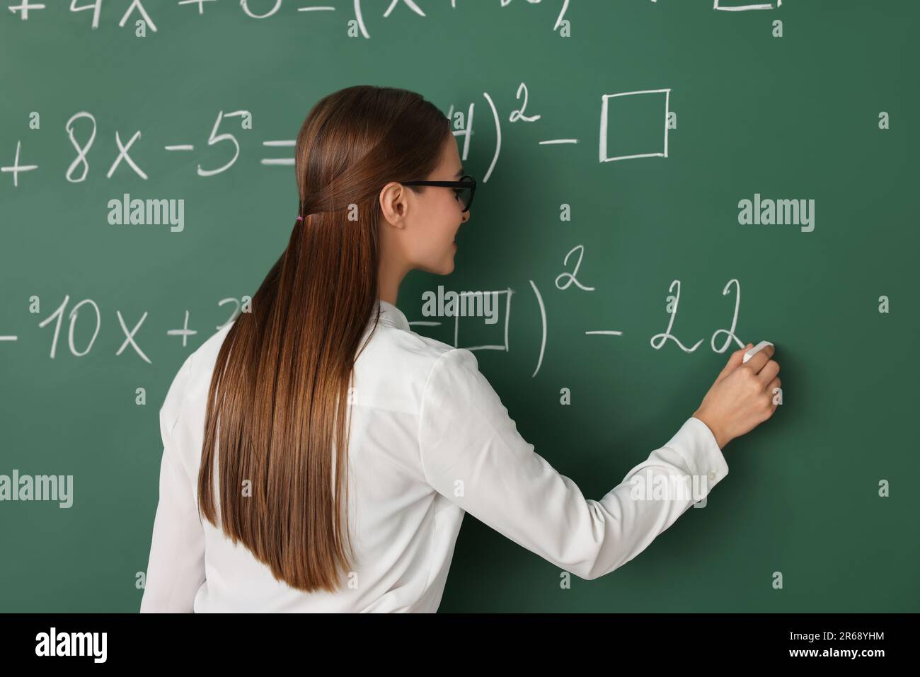 Mathematical equations board woman hi-res stock photography and images ...