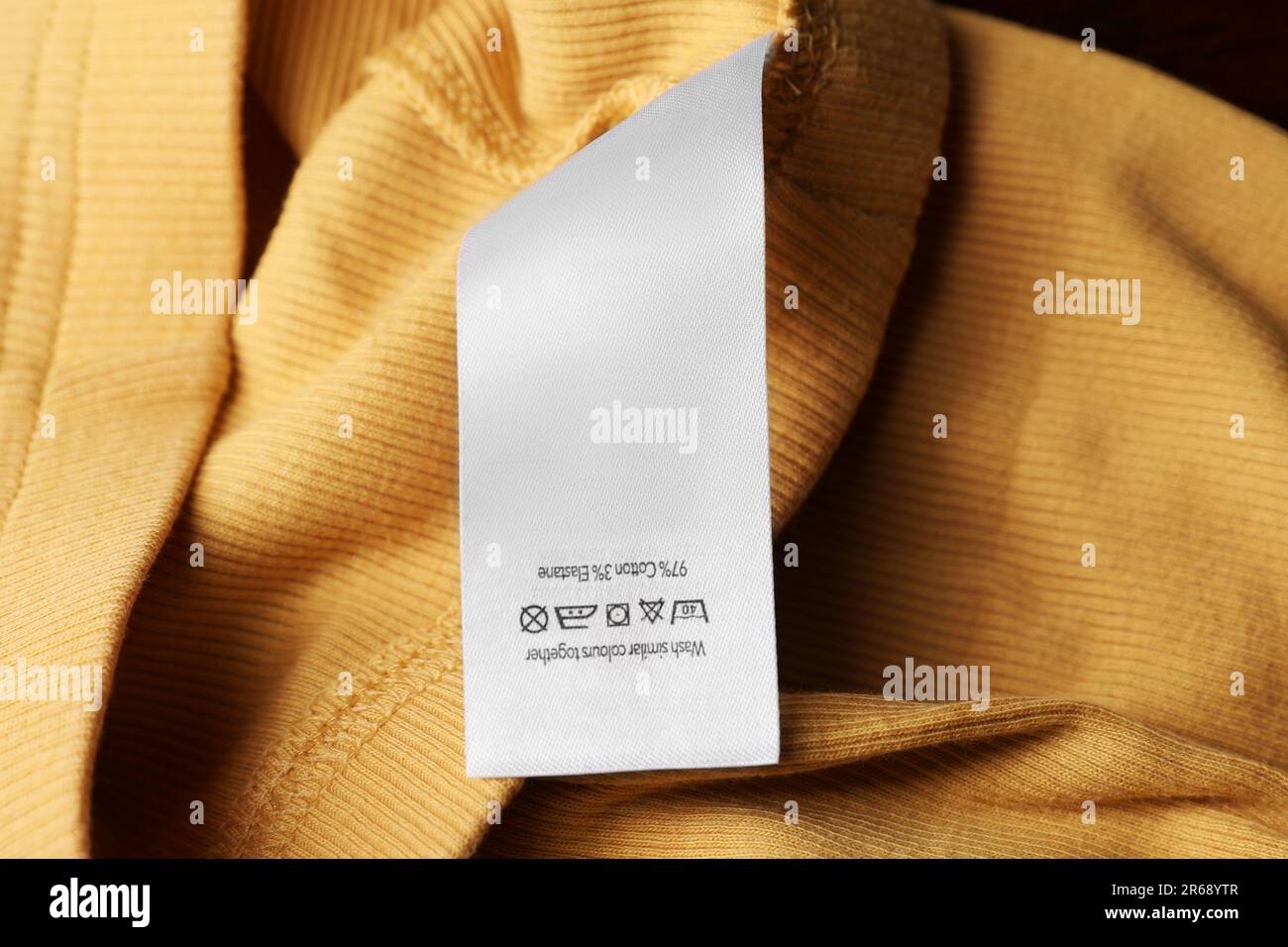 Yellow badge on their clothing hi-res stock photography and images - Alamy