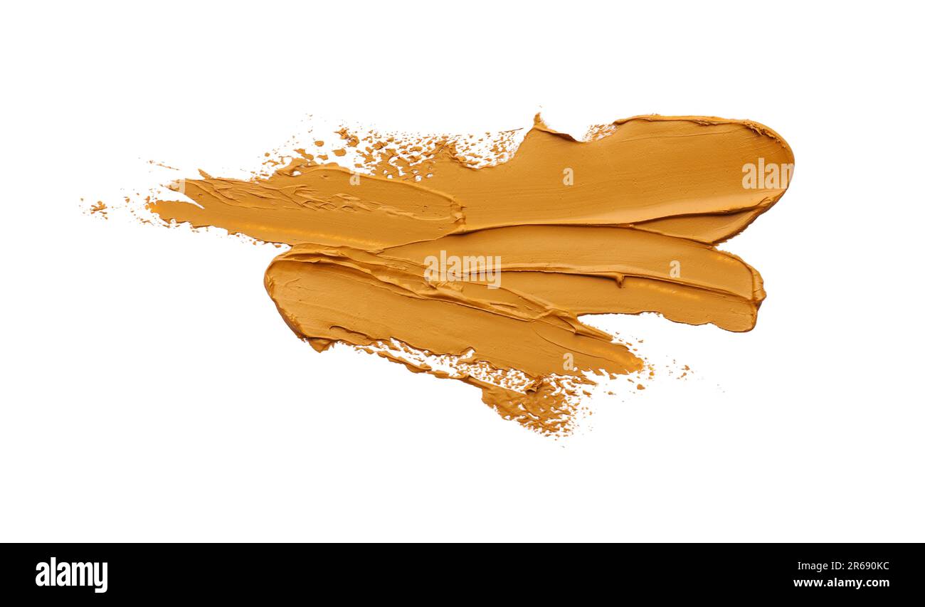 Light brown oil paint strokes on white background, top view Stock Photo ...