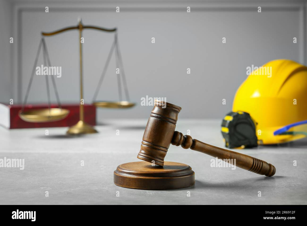 Construction and land law concepts. Judge gavel, scales of justice ...