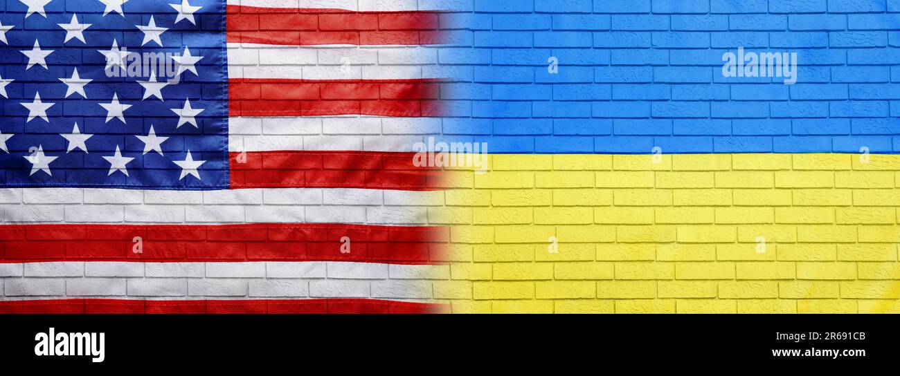 National flags of Ukraine and USA symbolizing partnership between ...