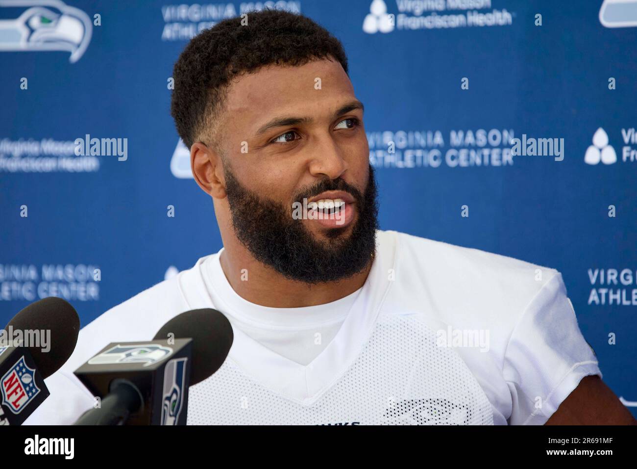 Seattle Seahawks safety Julian Love talks with the news media after an ...