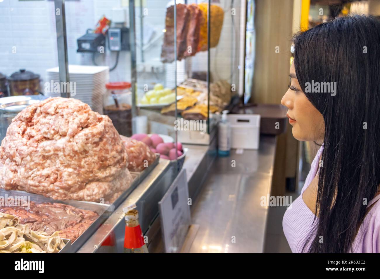 Meat counter woman hi-res stock photography and images - Alamy